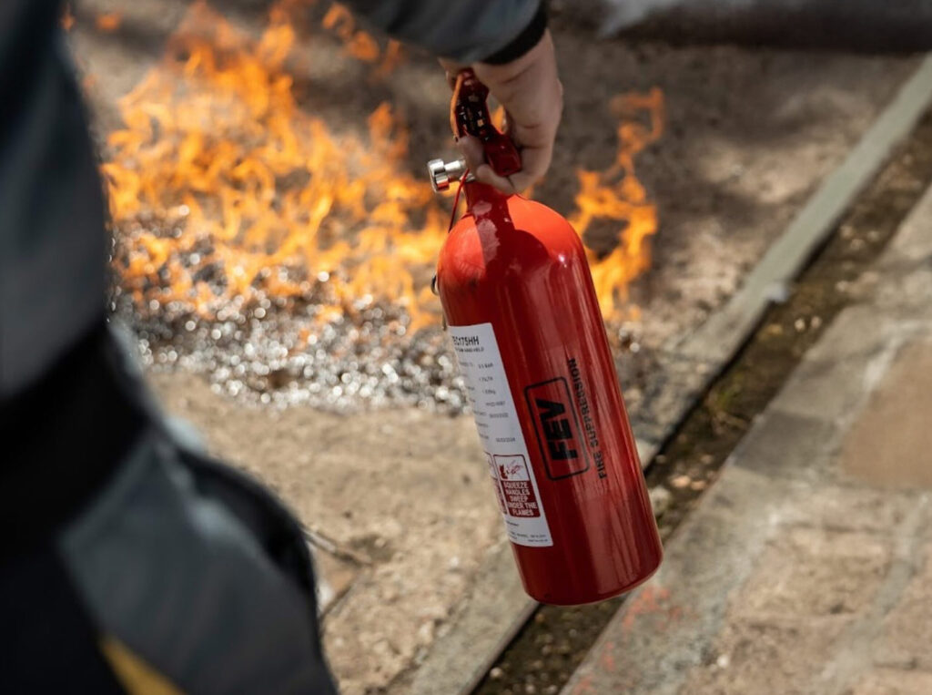 Handheld motorsport fire extinguishers - FEV Sire Suppression